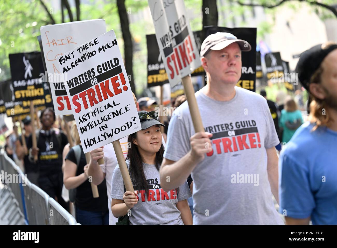Picketers carry signs outside NBC in Rockefeller Center on Monday, July ...