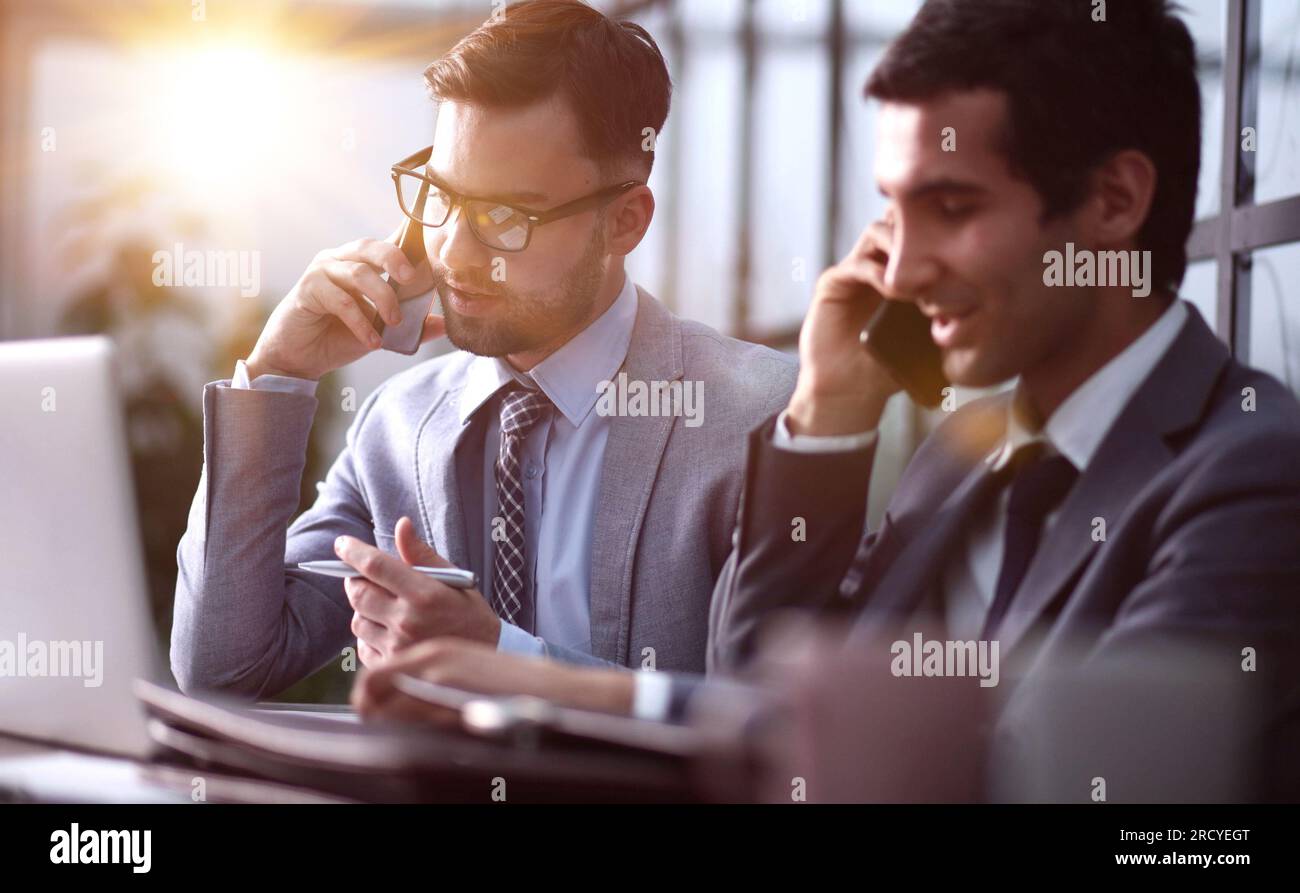 Sitting working concentration teamwork hi-res stock photography and ...