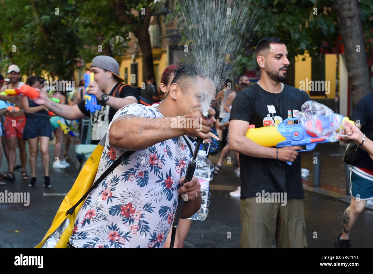 Madrid, Spain. 16th July, 2023. People splash water during a water ...