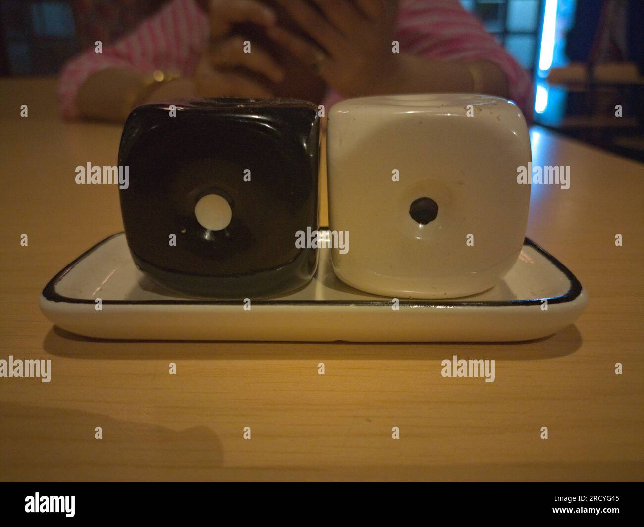 ludo dice shaped container in a restaurent Stock Photo - Alamy