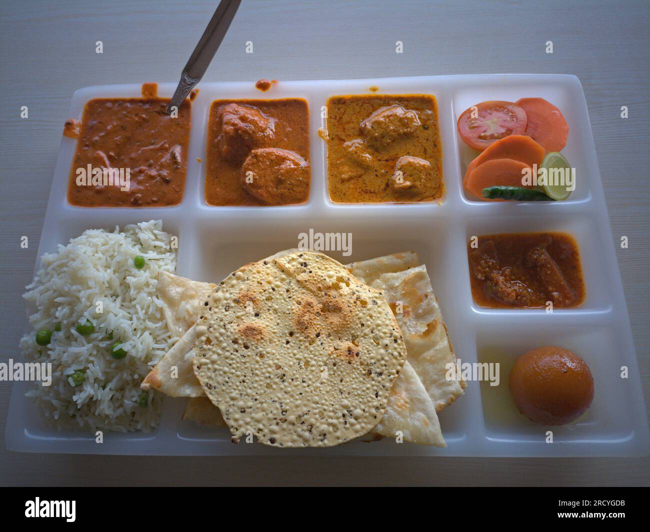 veg meal combo system in a single plate Stock Photo - Alamy