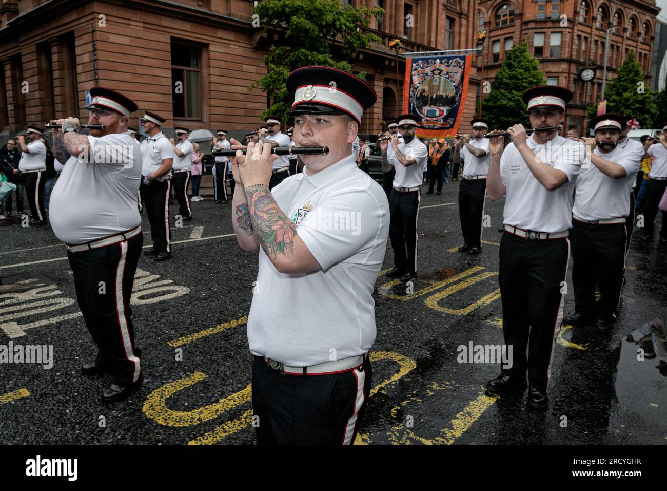 Members of the Shankill Protestant Boys band march through Belfast City ...