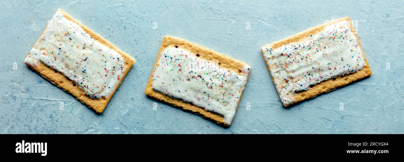 Pop tarts panorama. Poptart toaster pastry on a blue background ...