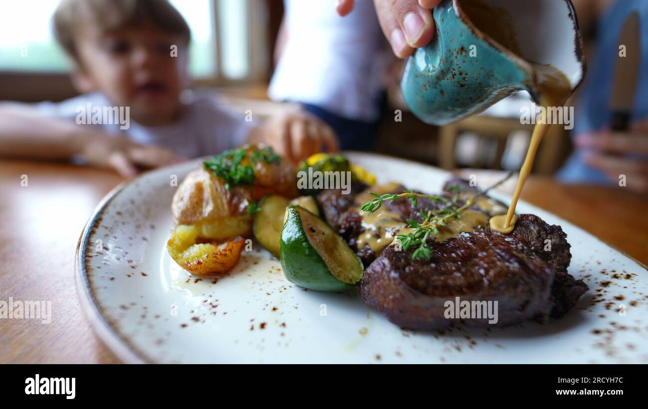 Person plate pouring salt hi-res stock photography and images - Alamy