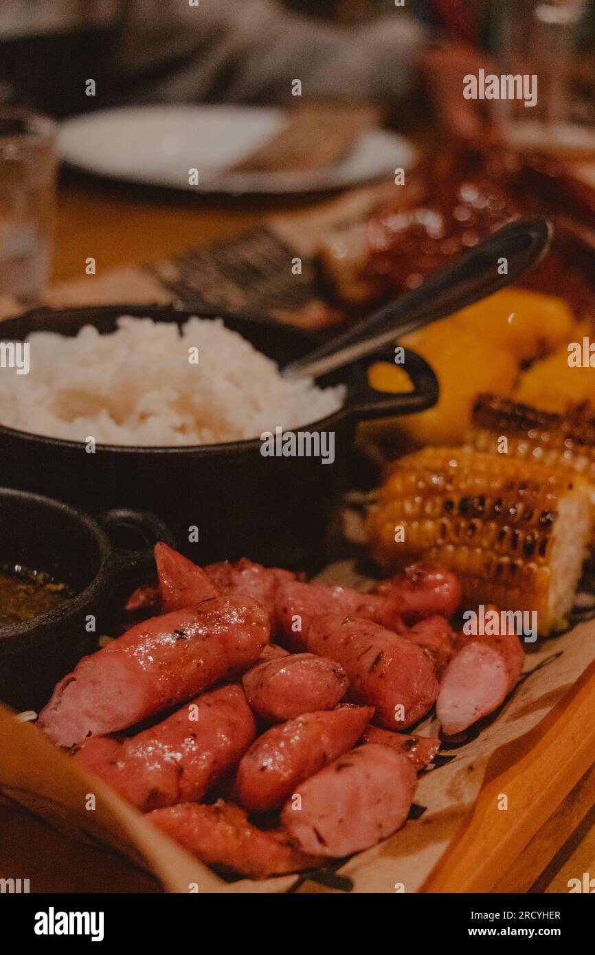 Delicious grilled sausages served hi-res stock photography and images ...