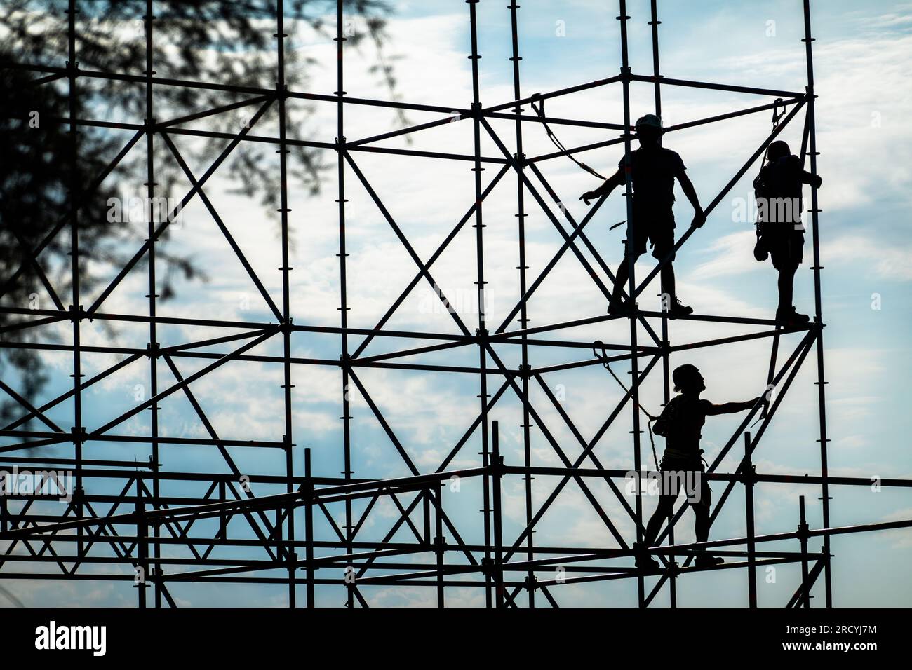 workers building a stage with scaffolding Stock Photo - Alamy