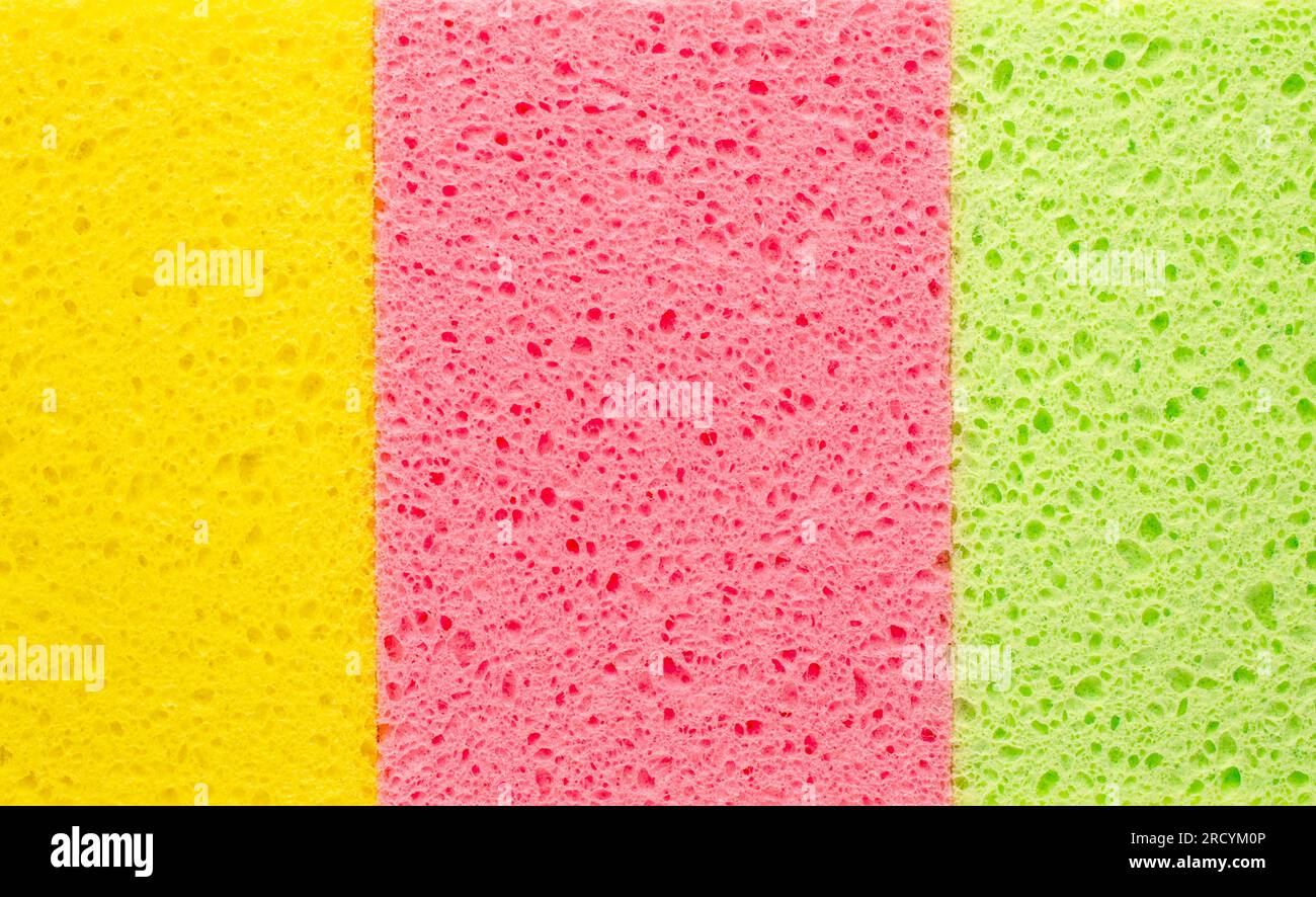 Three colored cellulose kitchen sponges, macro, top view Stock Photo ...