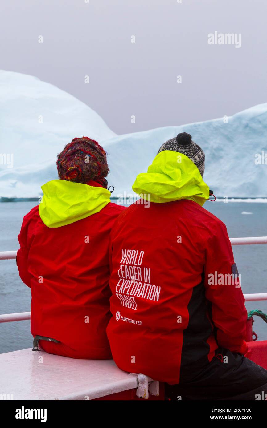 World Leader in Exploration Travel on back of Hurtigruten red jacket ...