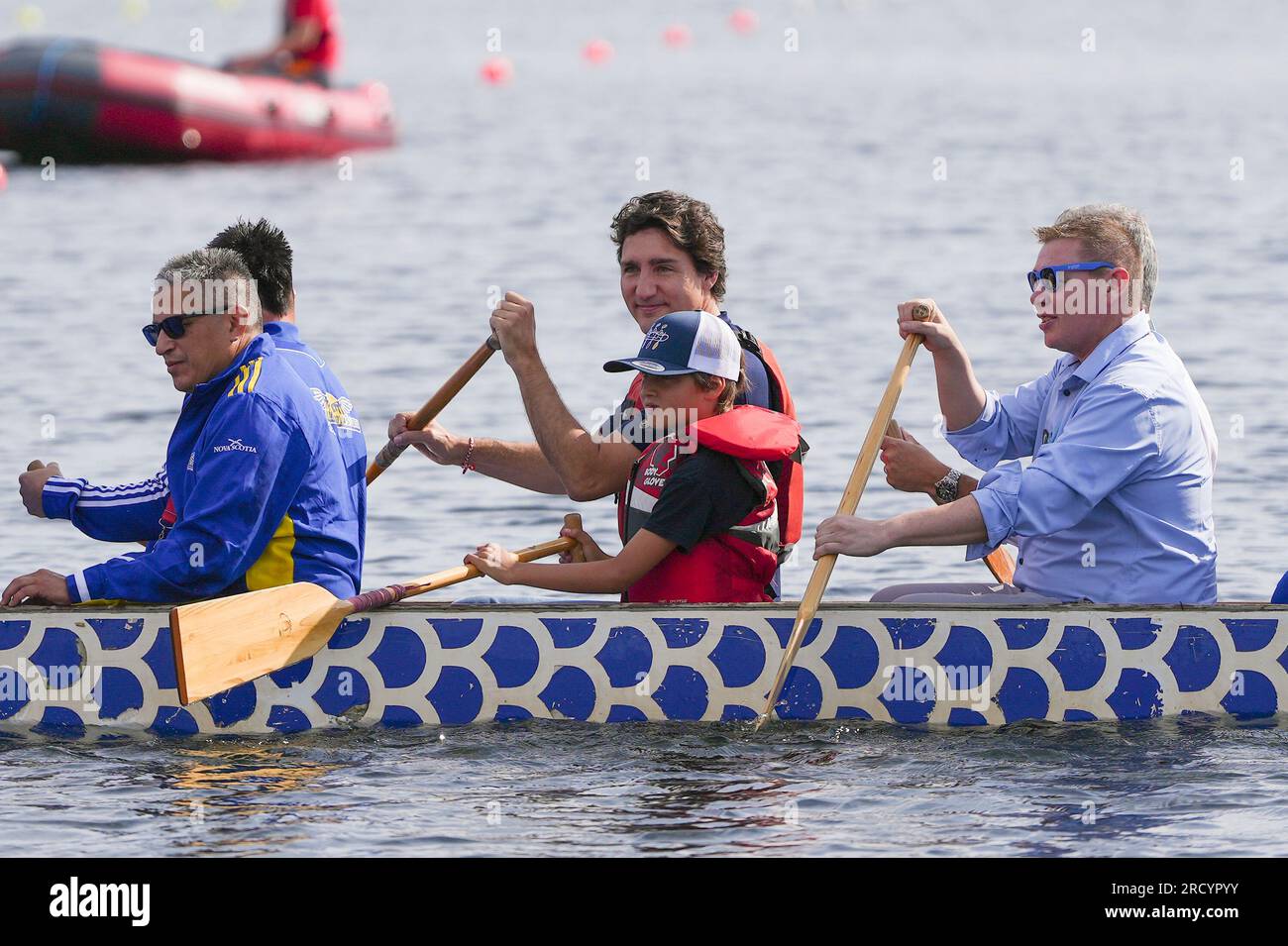 Prime Minister Justin Trudeau, center, and his son Hadrien join chiefs ...