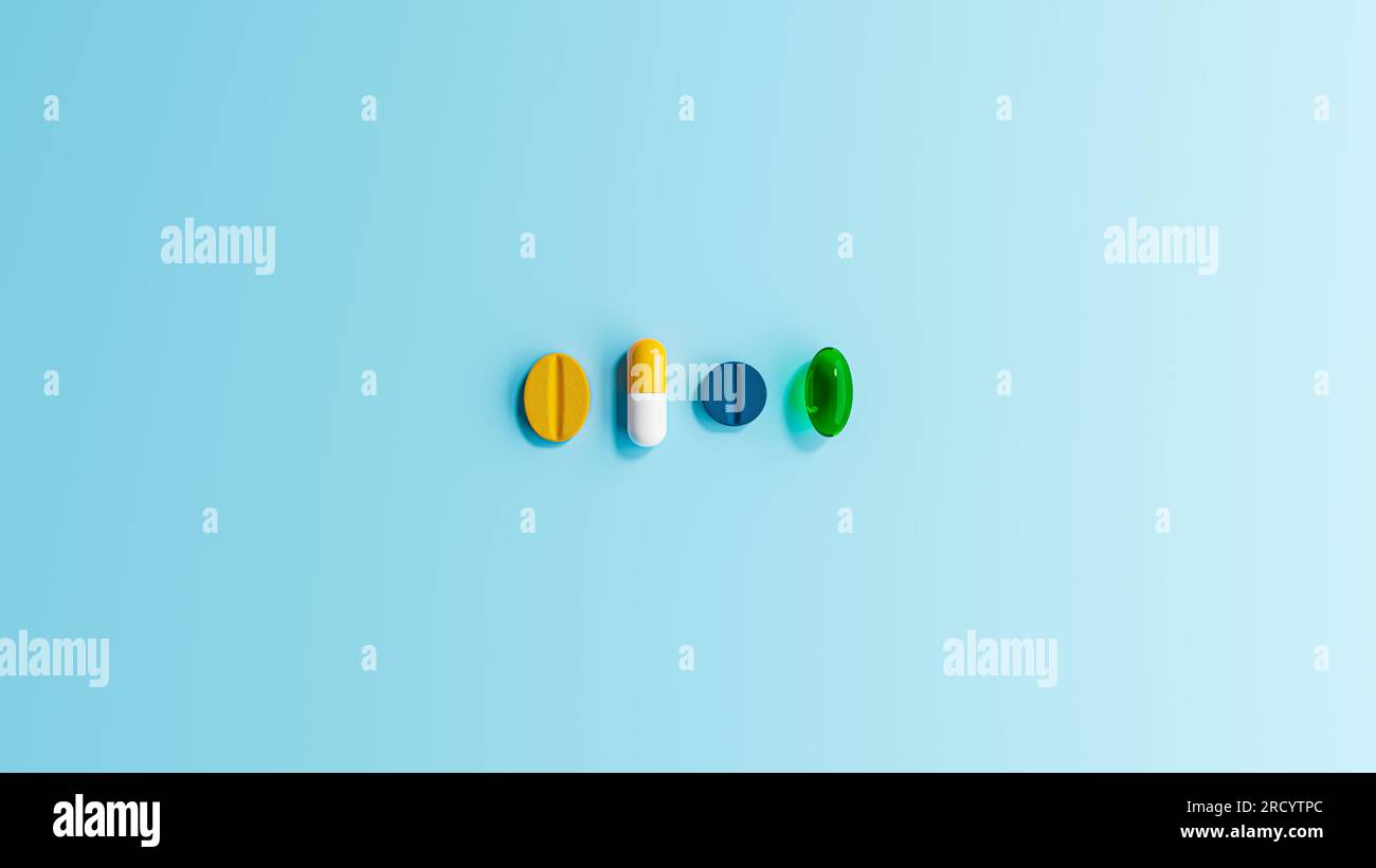 Medical tablets, capsules, and pills arranged in a row next to each ...