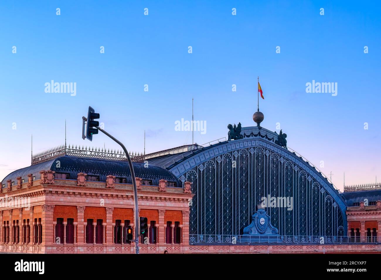 Madrid, Spain - February 9, 2023: Architectural feature in Atocha Train Station. Dawn scene of ...