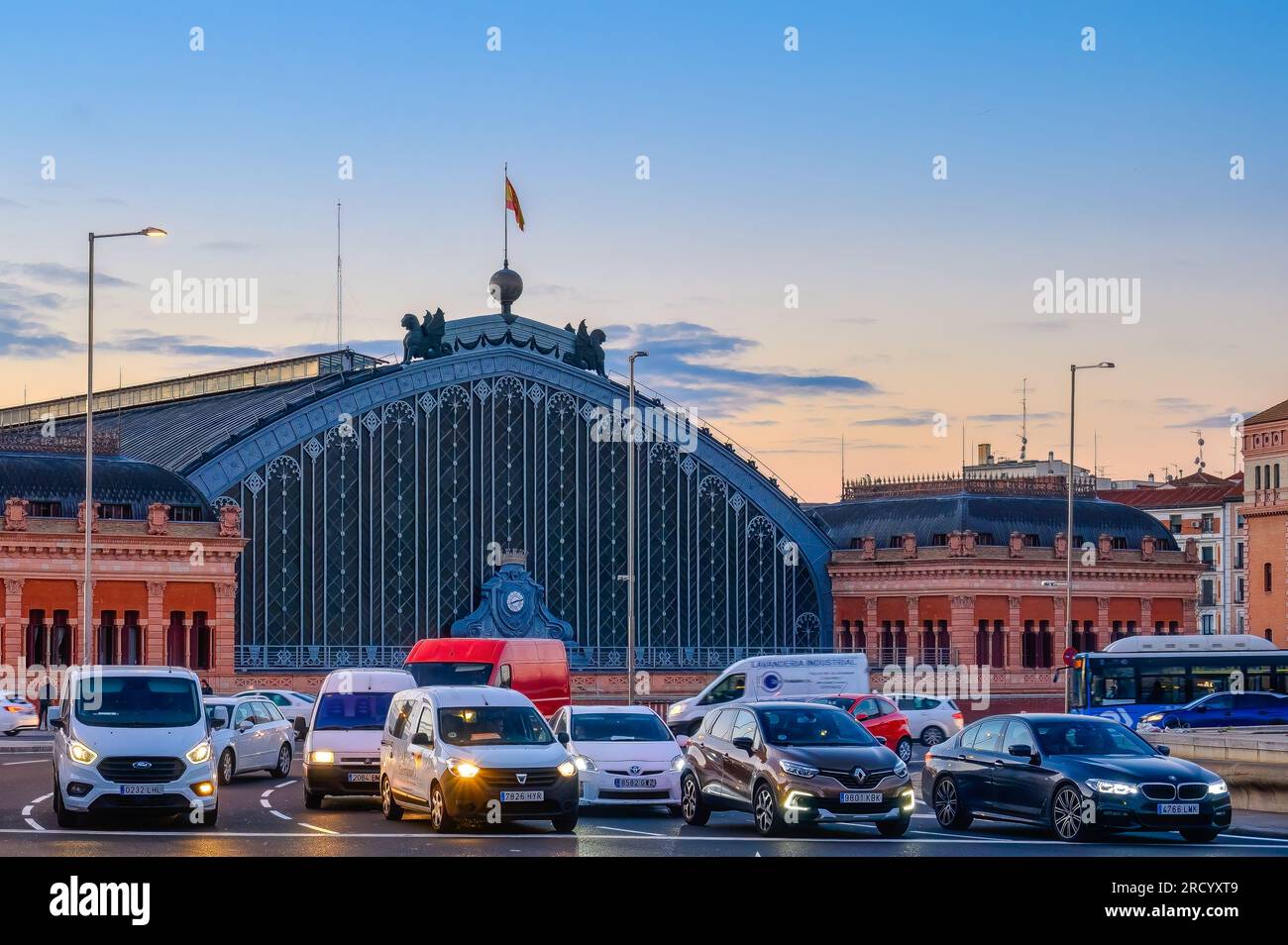 Madrid, Spain - February 9, 2023: Architectural feature in Atocha Train Station. Morning traffic ...