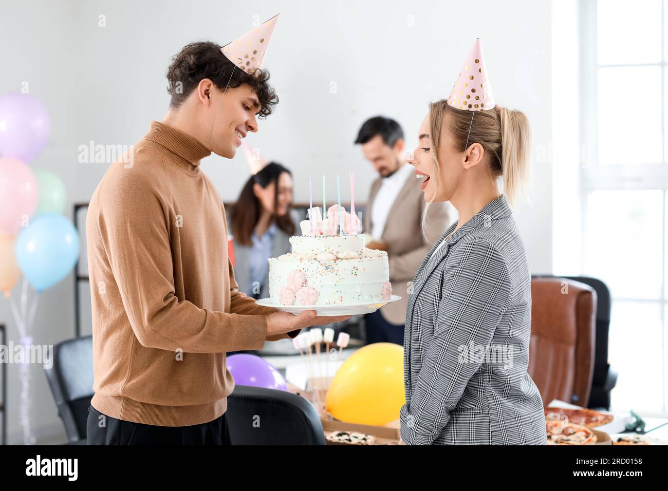 Team greeting colleague office birthday hi-res stock photography and ...