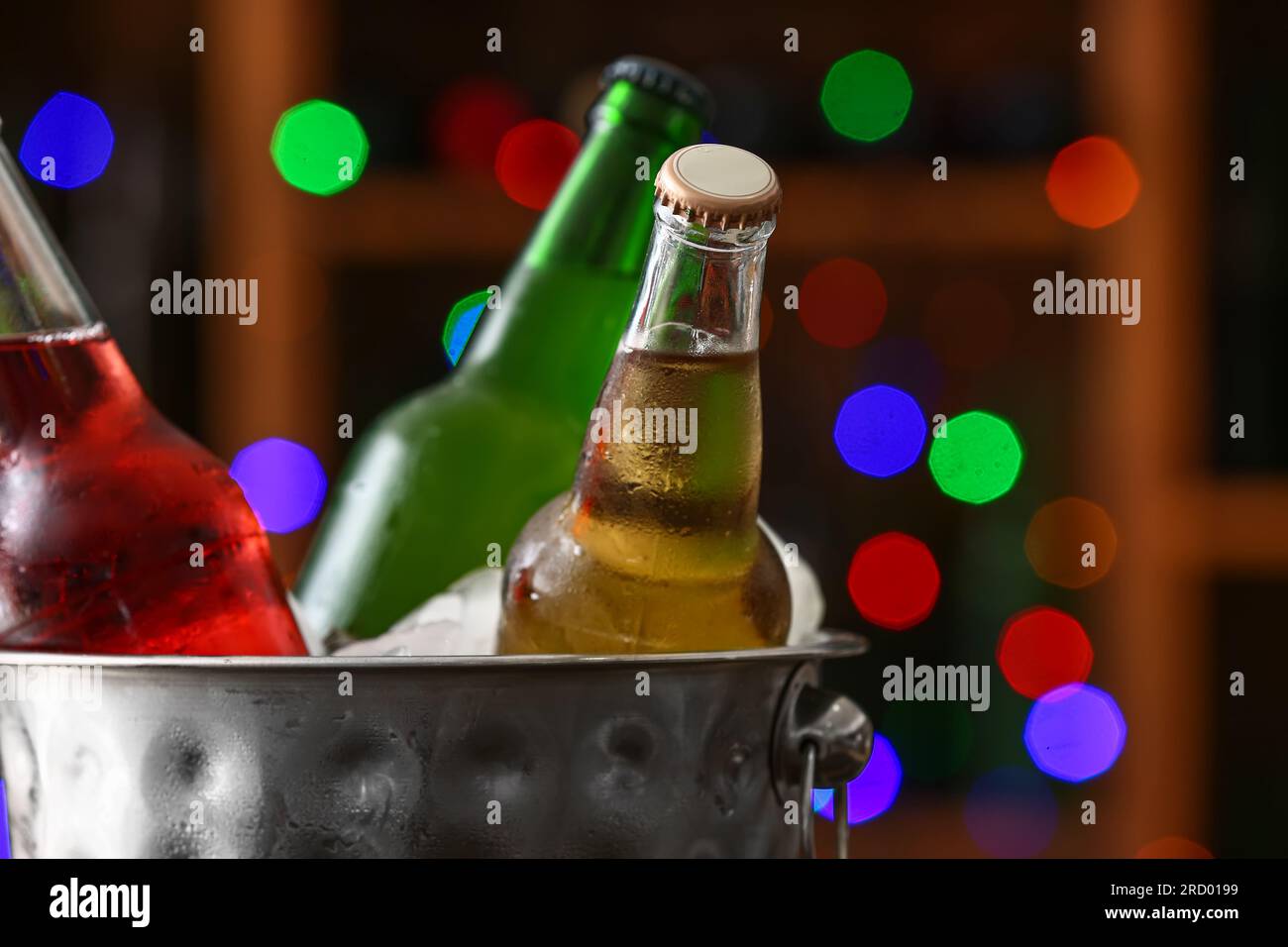Bucket with bottles of cold beer in bar, closeup Stock Photo - Alamy