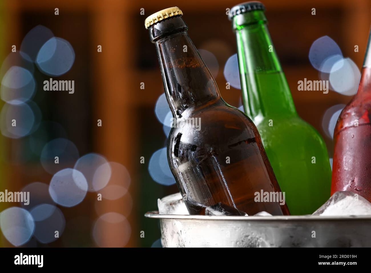 Bucket with bottles of cold beer in bar, closeup Stock Photo - Alamy