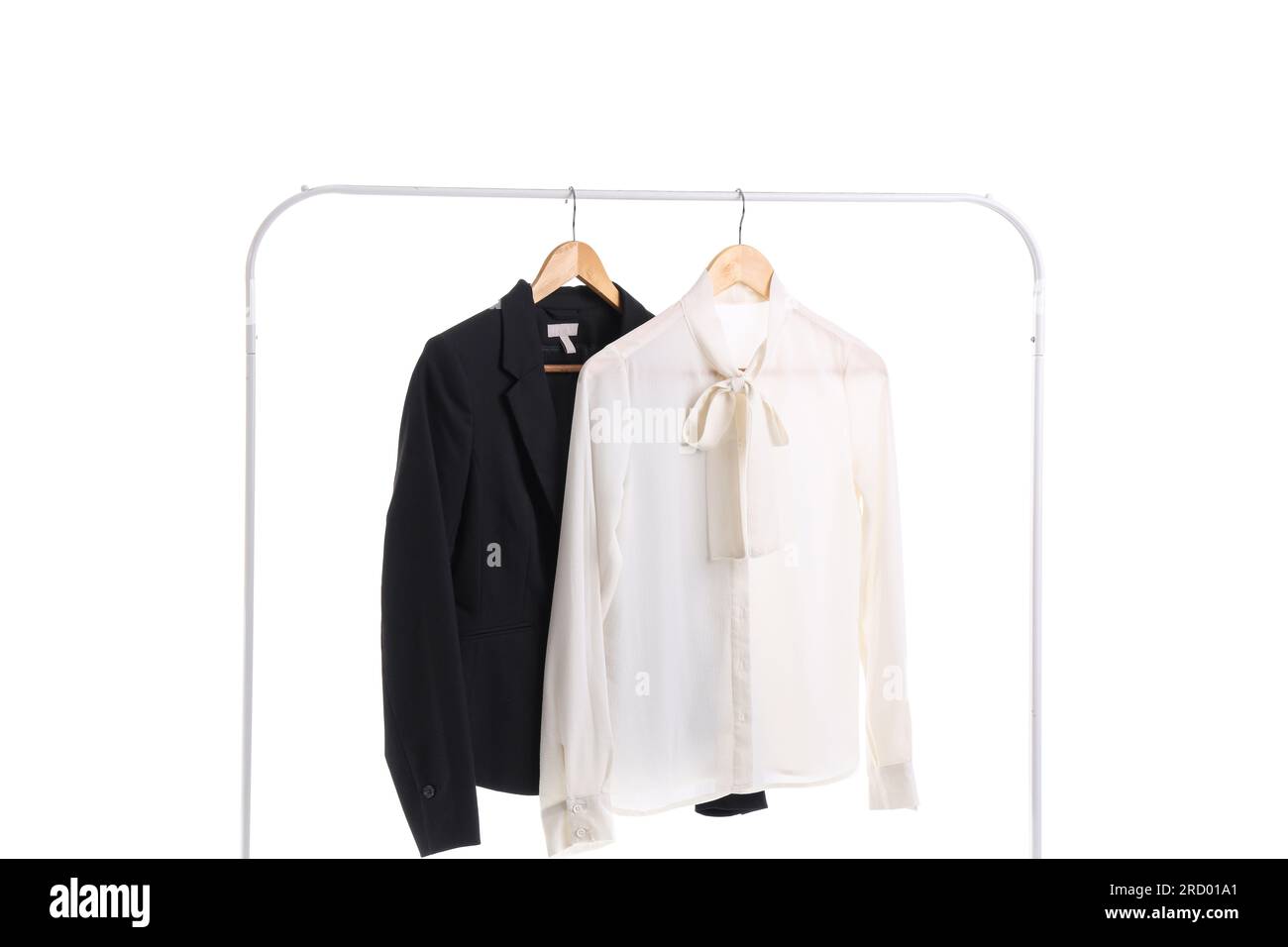 Rack with stylish classic school uniform on white background Stock ...