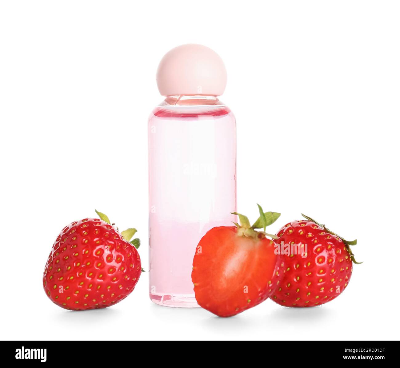 Bottle of cosmetic product and ripe strawberry on white background ...