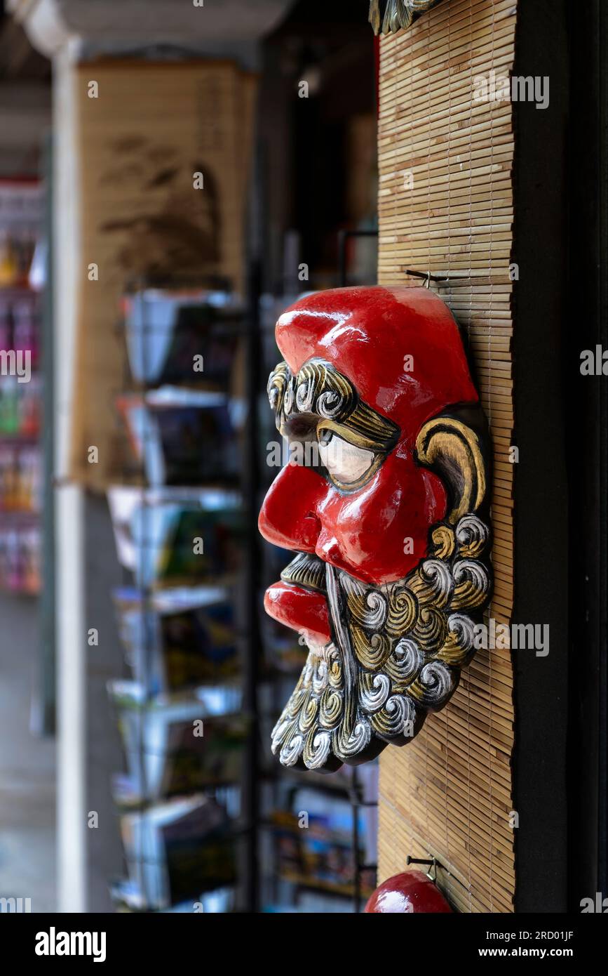 Traditional Vietnamese red mask in the Temple of Literature in Hanoi ...