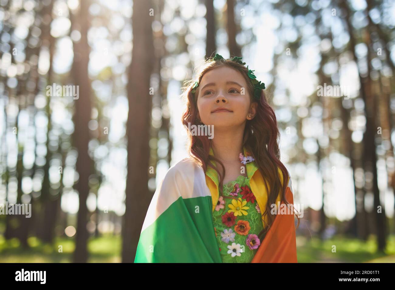 Beautiful little girl dressed as a pixie in St Patricks Day. Portrait ...