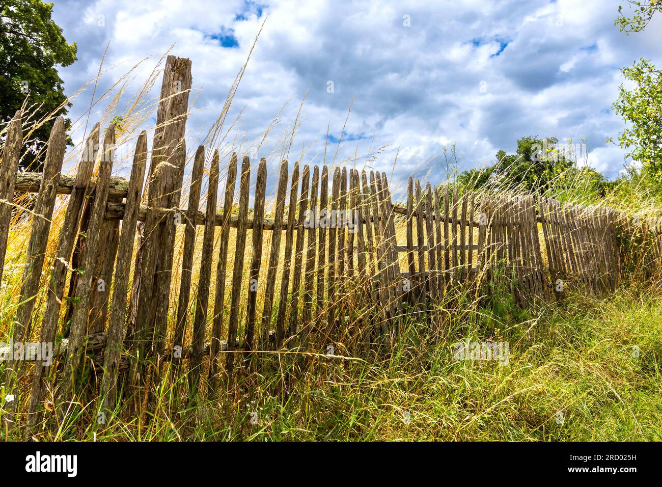 Rickety old fence around old garden - Rosnay, Indre (36), France Stock ...