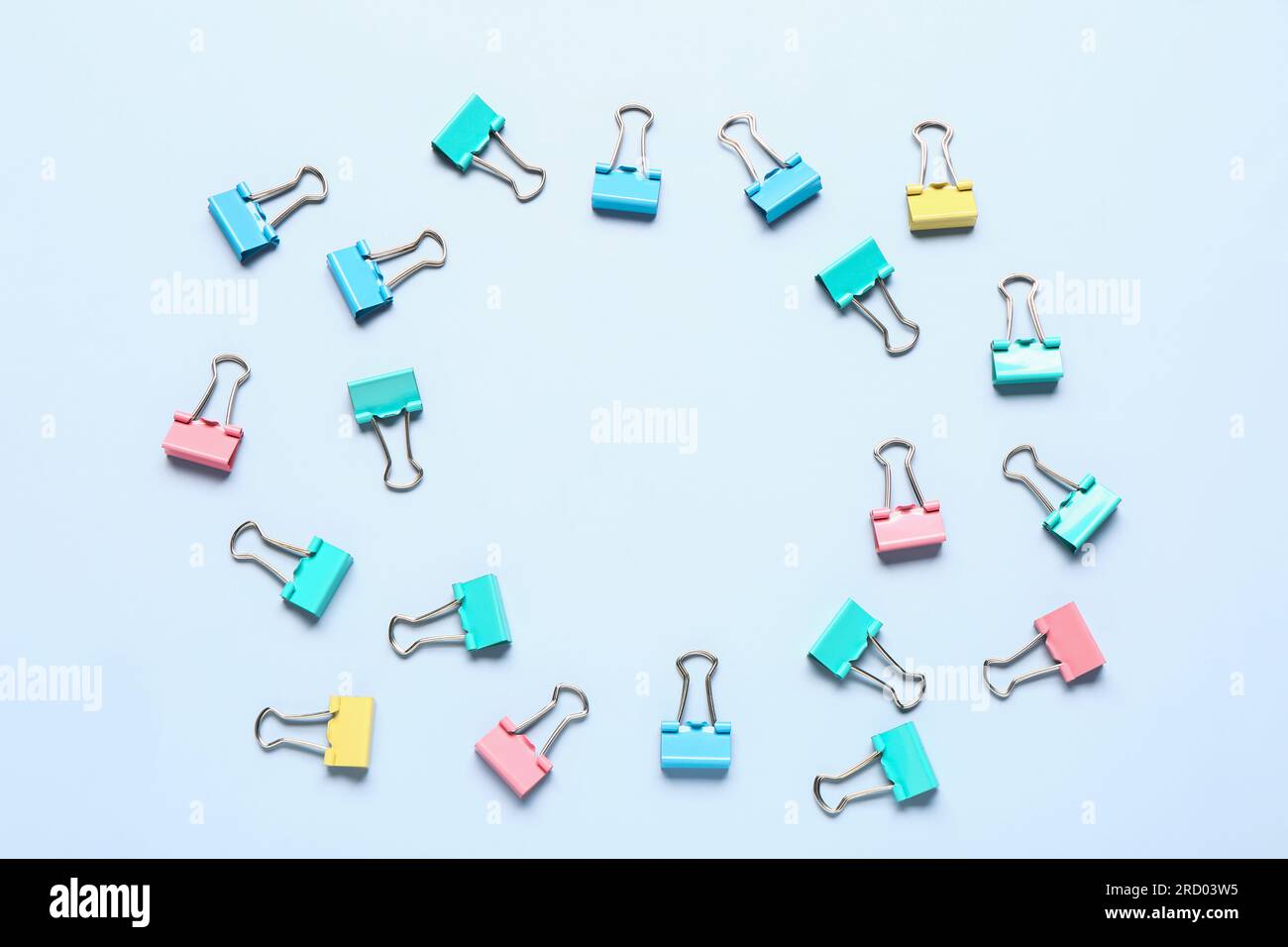 Frame made of colorful binder clips on light blue background Stock ...