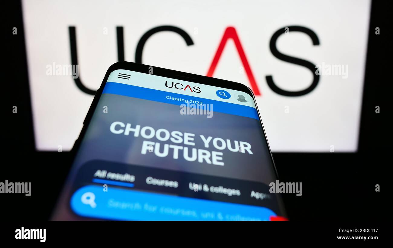 Mobile phone with website of Universities and Colleges Admissions ...