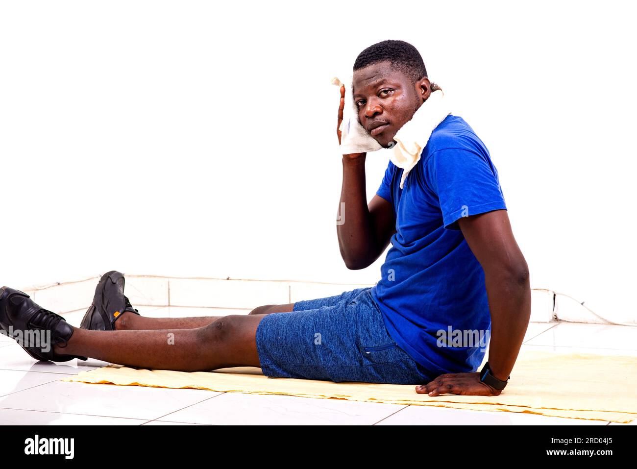 Tired sportsman wiping forehead arm hi-res stock photography and images ...