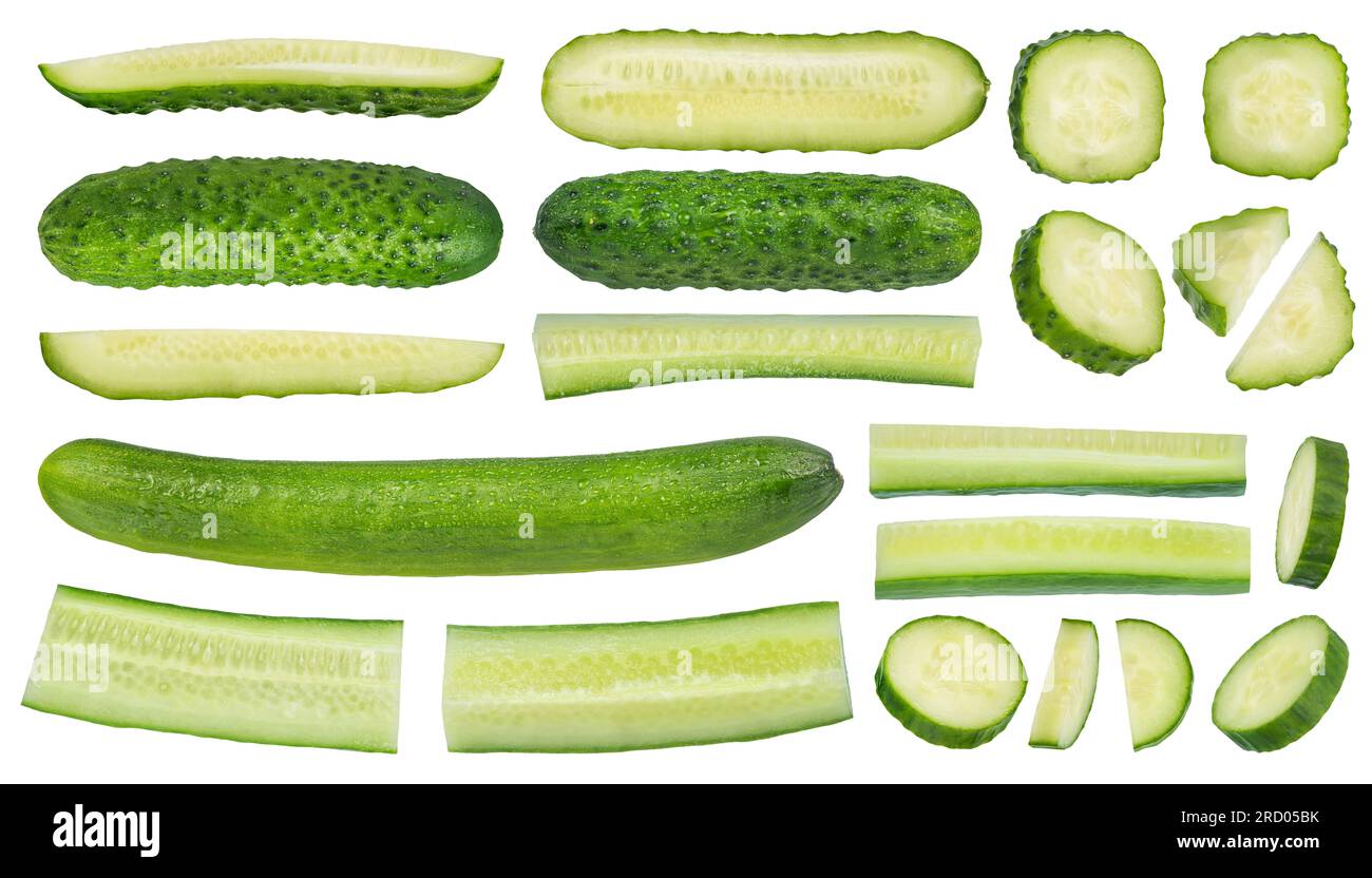A large set of cucumbers of different sizes on a white isolated ...