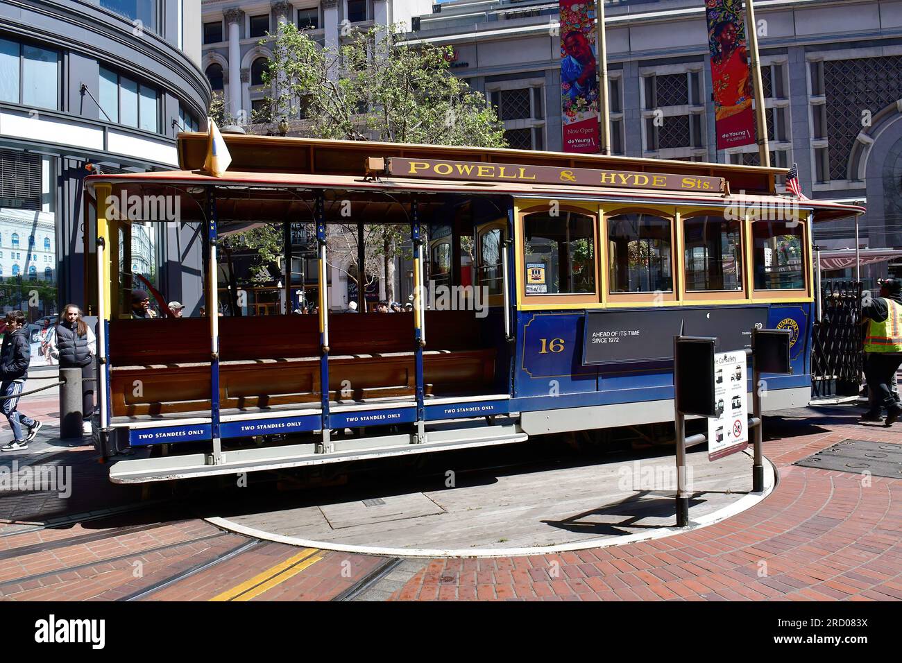 Drivers turning cable car on a turntable, San Francisco, California ...