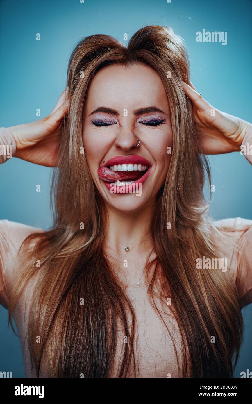 Young woman emotional studio portrait Stock Photo - Alamy