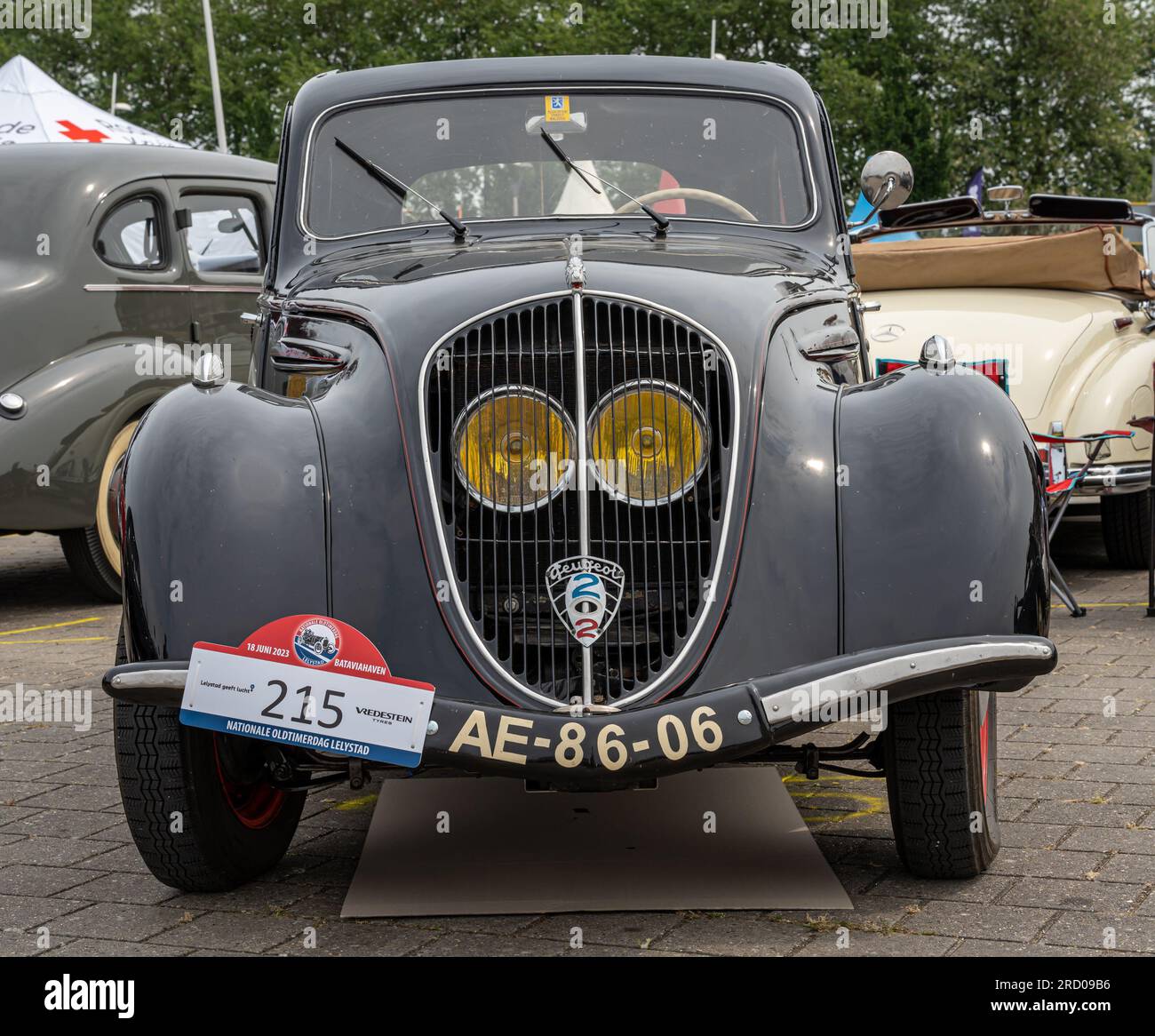 Lelystad, The Netherlands, 18.06.2023, Front view of retro car Peugeot ...