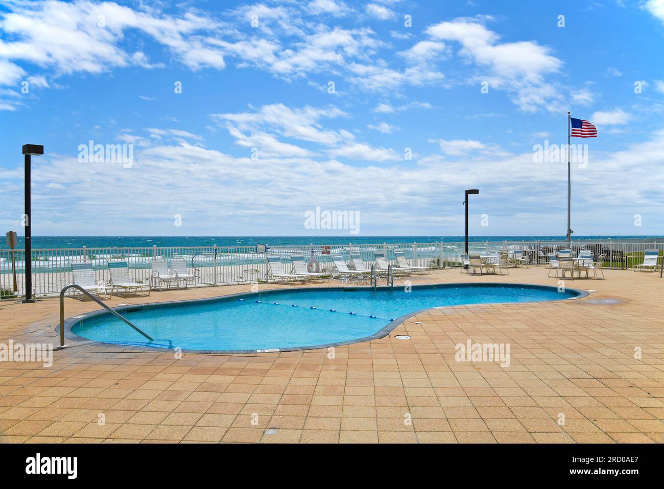 Large Outdoor Swimming Pool at a Resort on the Gulf of Mexico Stock ...