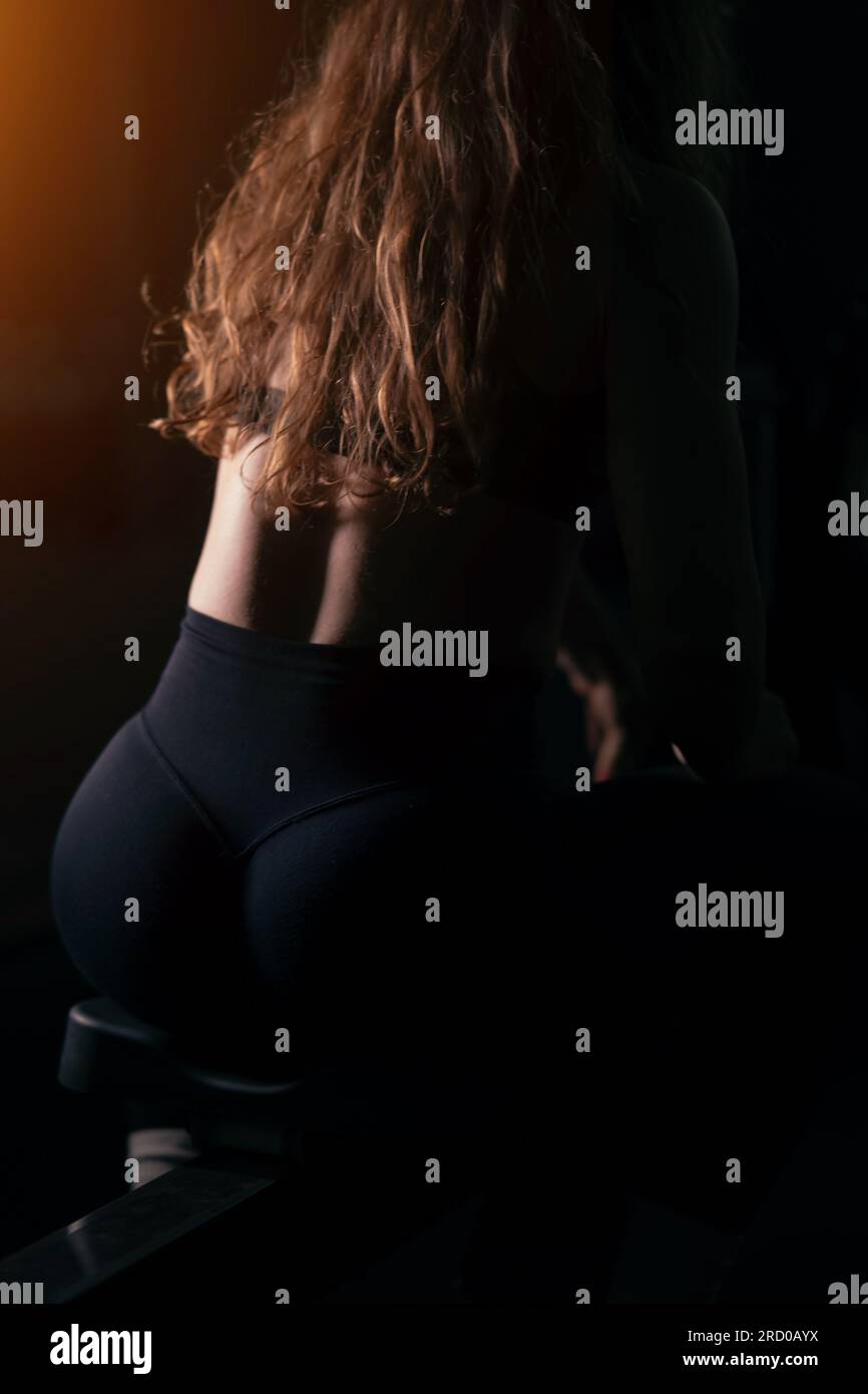 Athletic Beautiful Woman Does her cross fitness at gym Stock Photo - Alamy