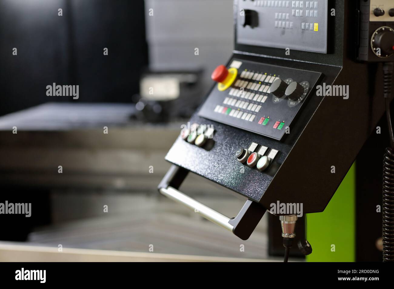 Control console of CNC vertical machining center close up. Selective ...