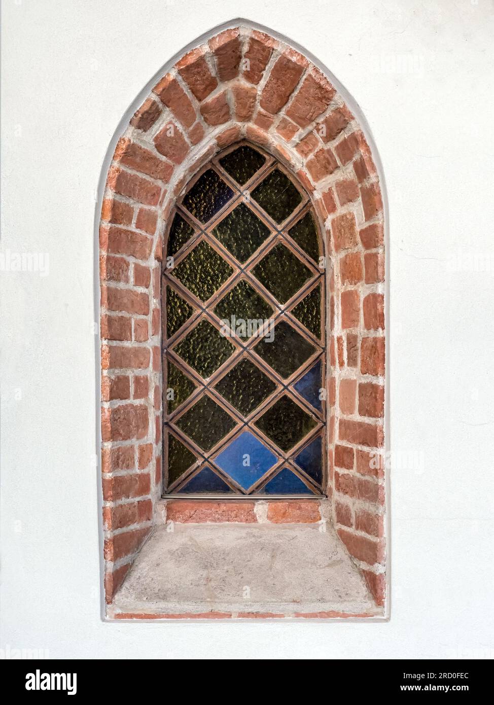 Medieval window with stained glass in historical church, Krakow Poland ...