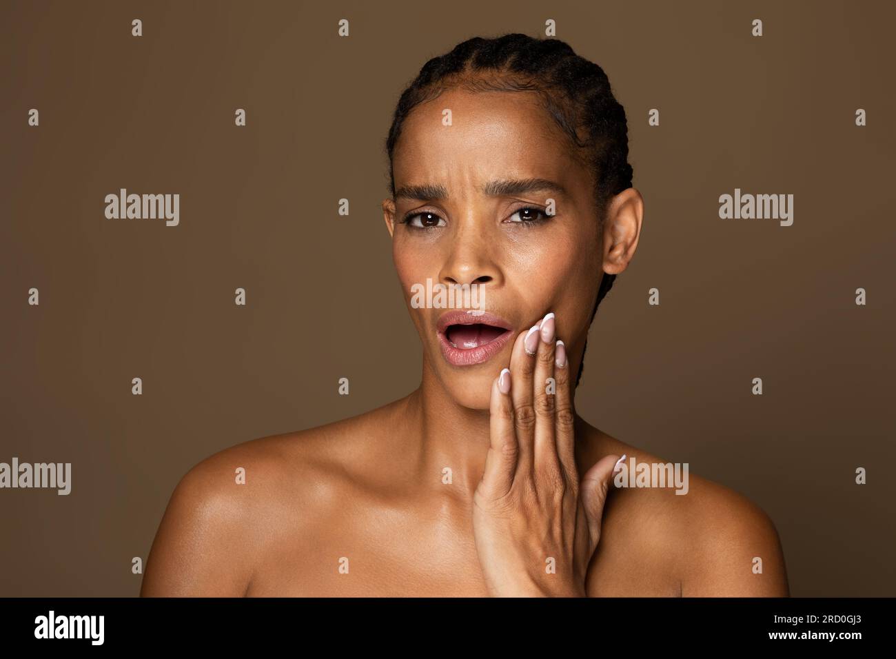 Teeth problem. Black middle aged woman suffering from acute toothache ...