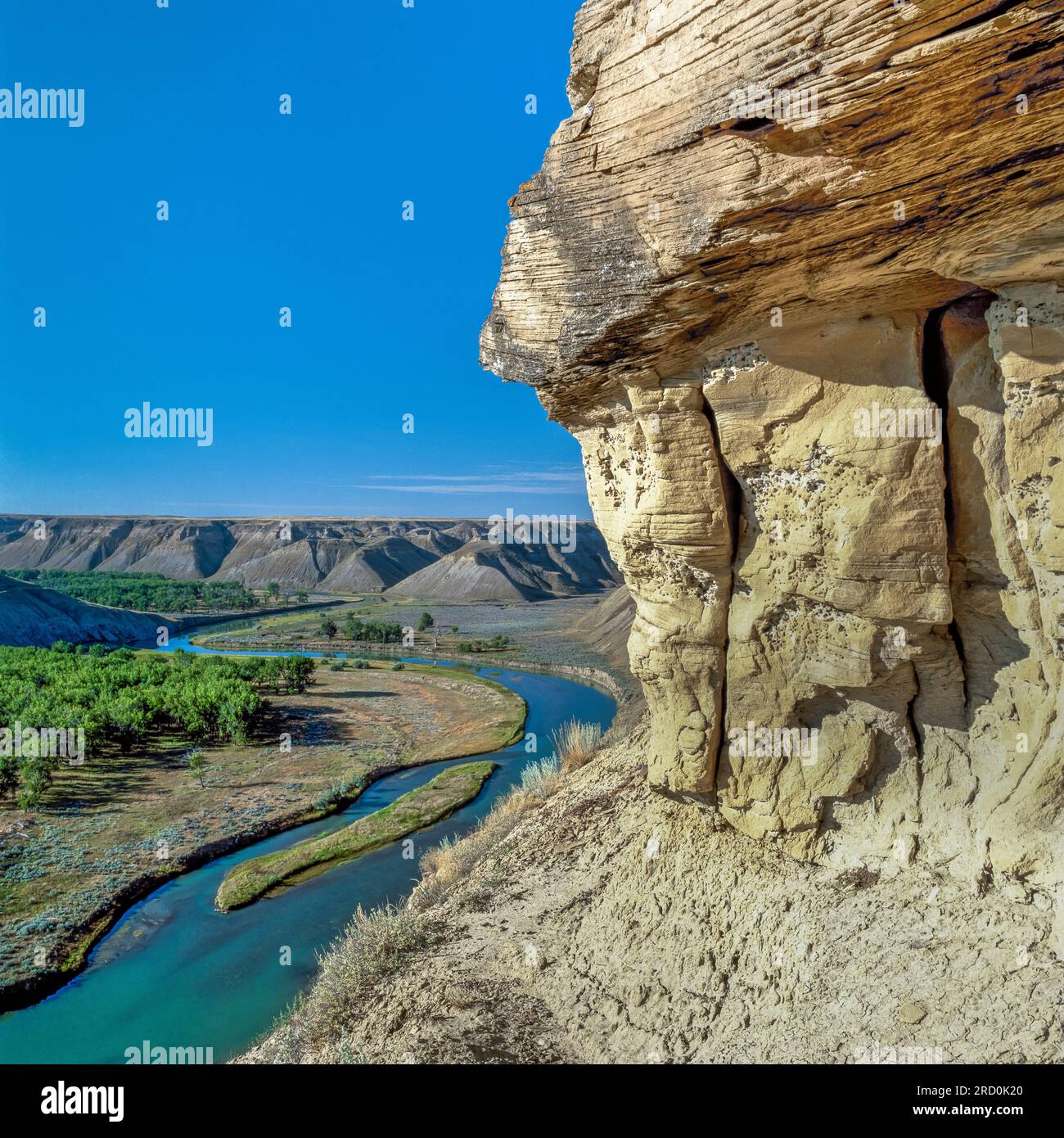 marias river valley below a cliff and badlands on the prairie near loma, montana Stock Photo - Alamy