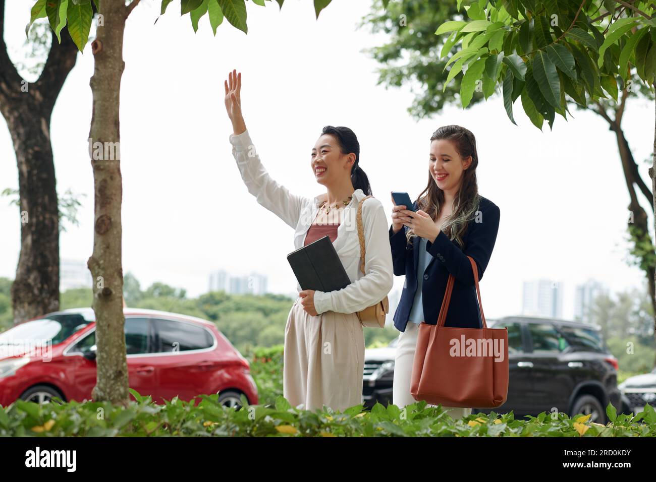 Waving to attract attention hi-res stock photography and images - Alamy