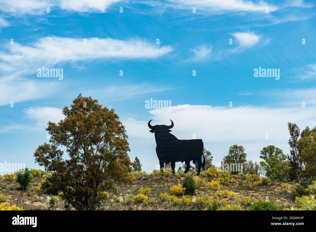 Billboard of the famous Osborne bull in the mountains of Andalusia ...