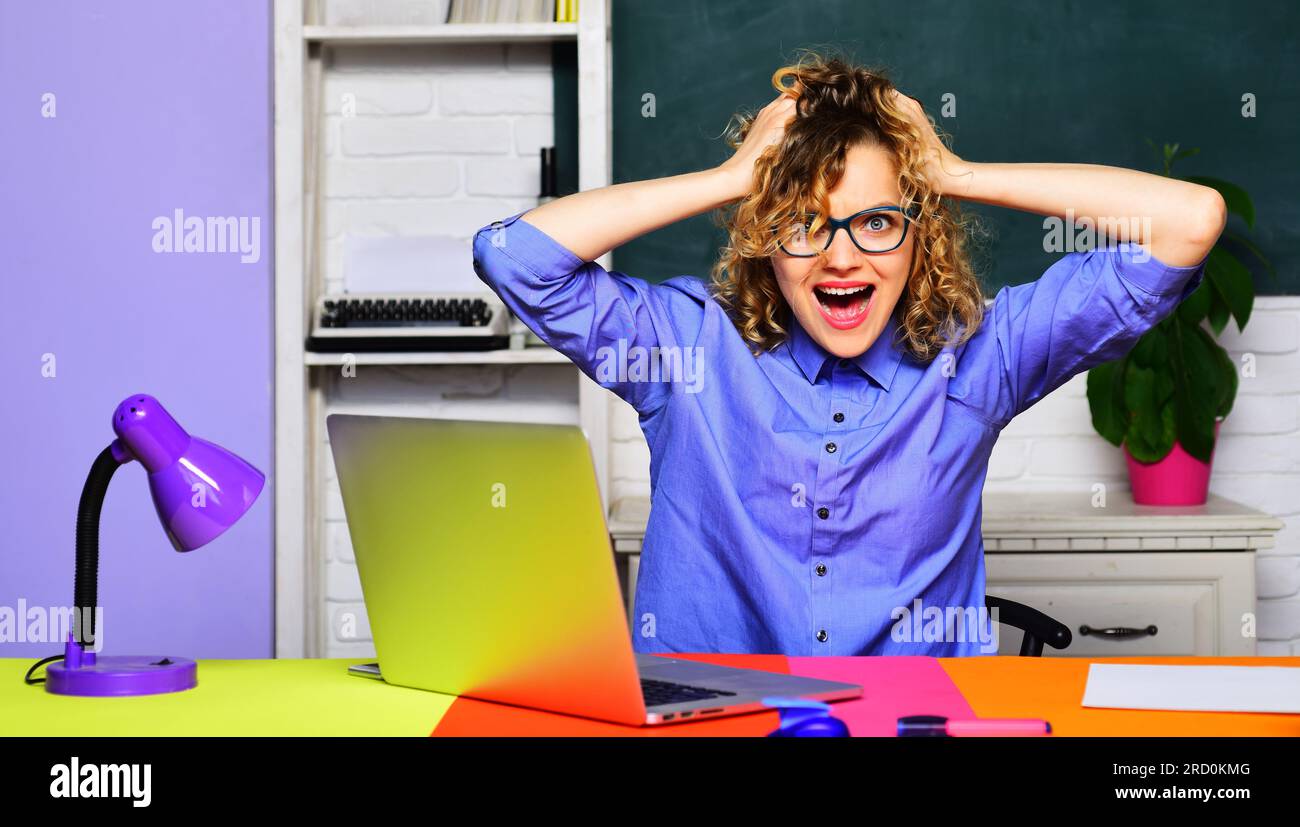 Excited female teacher or university professor at workplace. Teachers ...