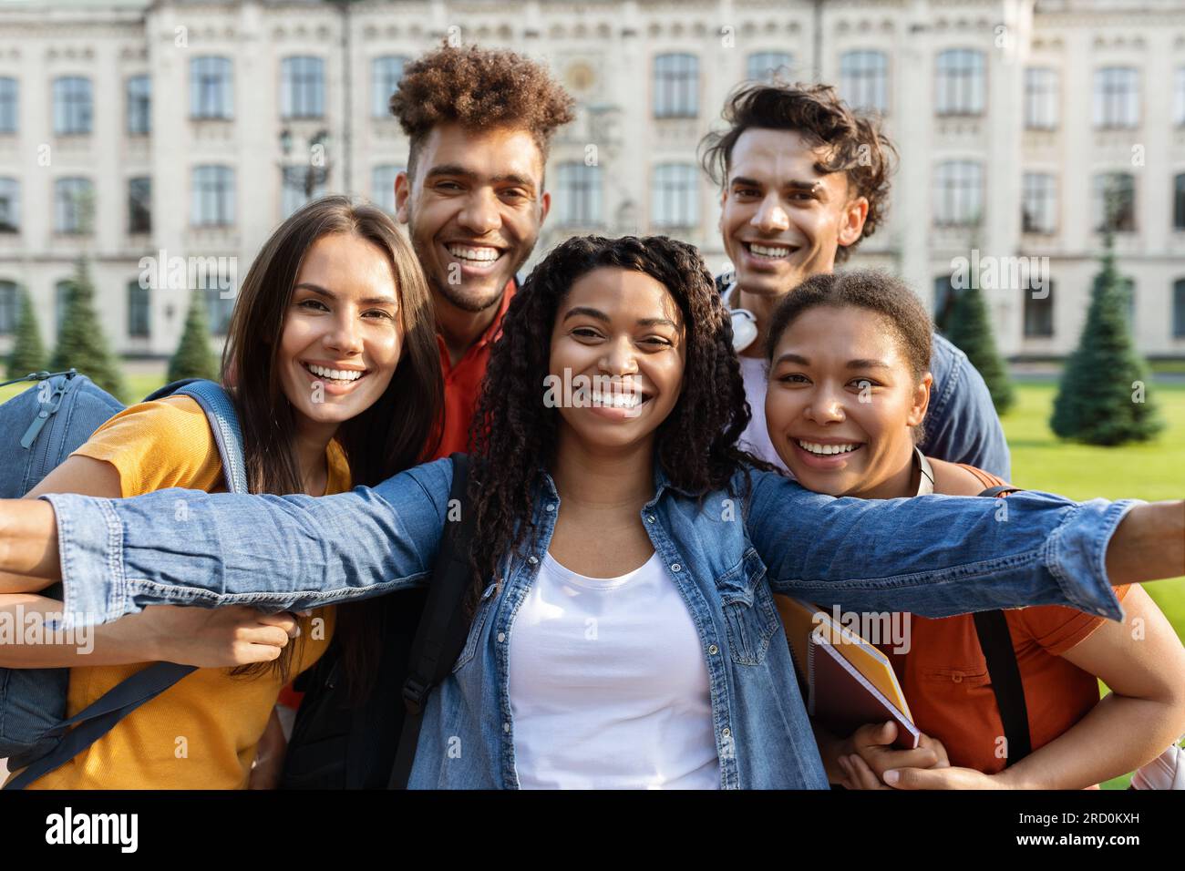 Cheerful Multicultural Students Making Selfie Near University Building, Posing Together Outdoors ...