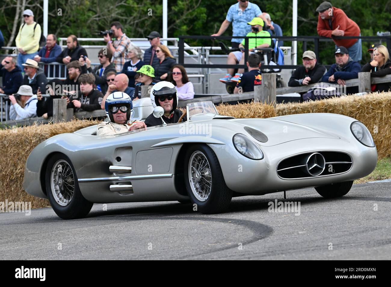 Goodwood, UK. 16th July, 2023. Jochen Mass in a Mercedes Benz 300 SLR ...