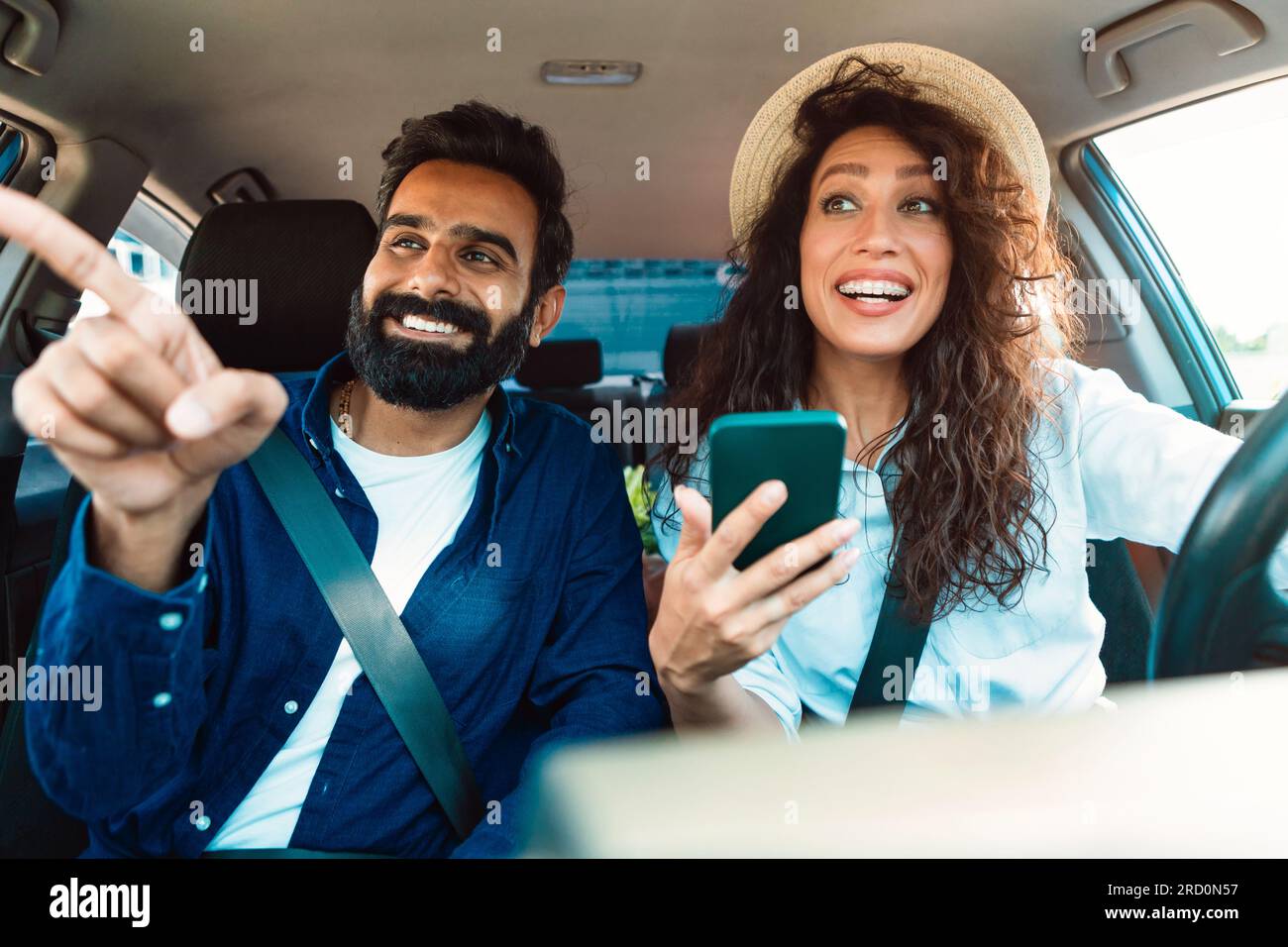 Family holding steering wheel hi-res stock photography and images - Alamy