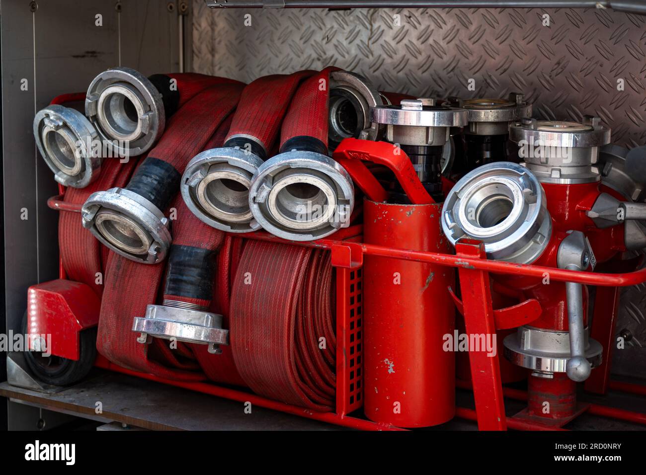 Fire engine equipment from the inside - fire hose hoses ready for use ...