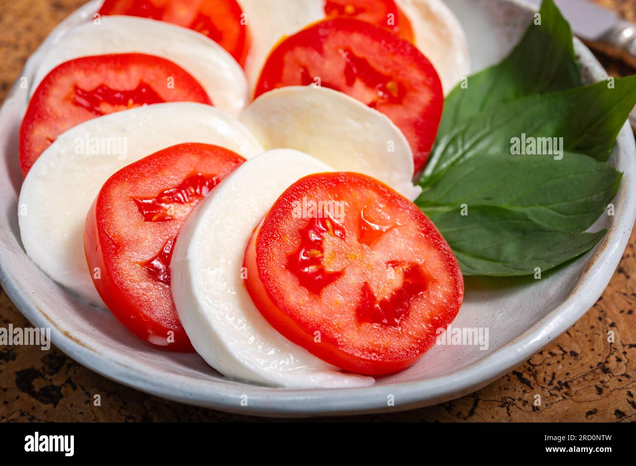 Itaian vegetarian food, fresh caprese salad made with white soft ...