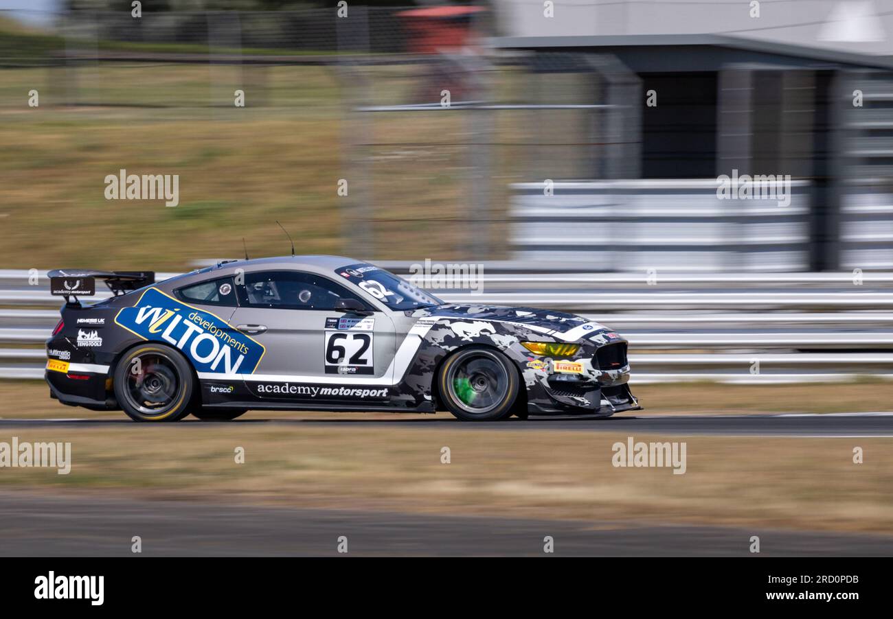 Panning photograph of sports racing car on Snetterton track Stock Photo ...