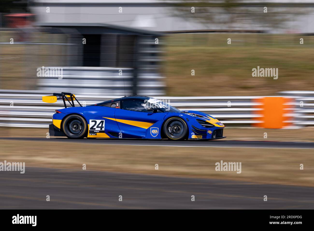 Panning photograph of sports racing car on Snetterton track Stock Photo ...