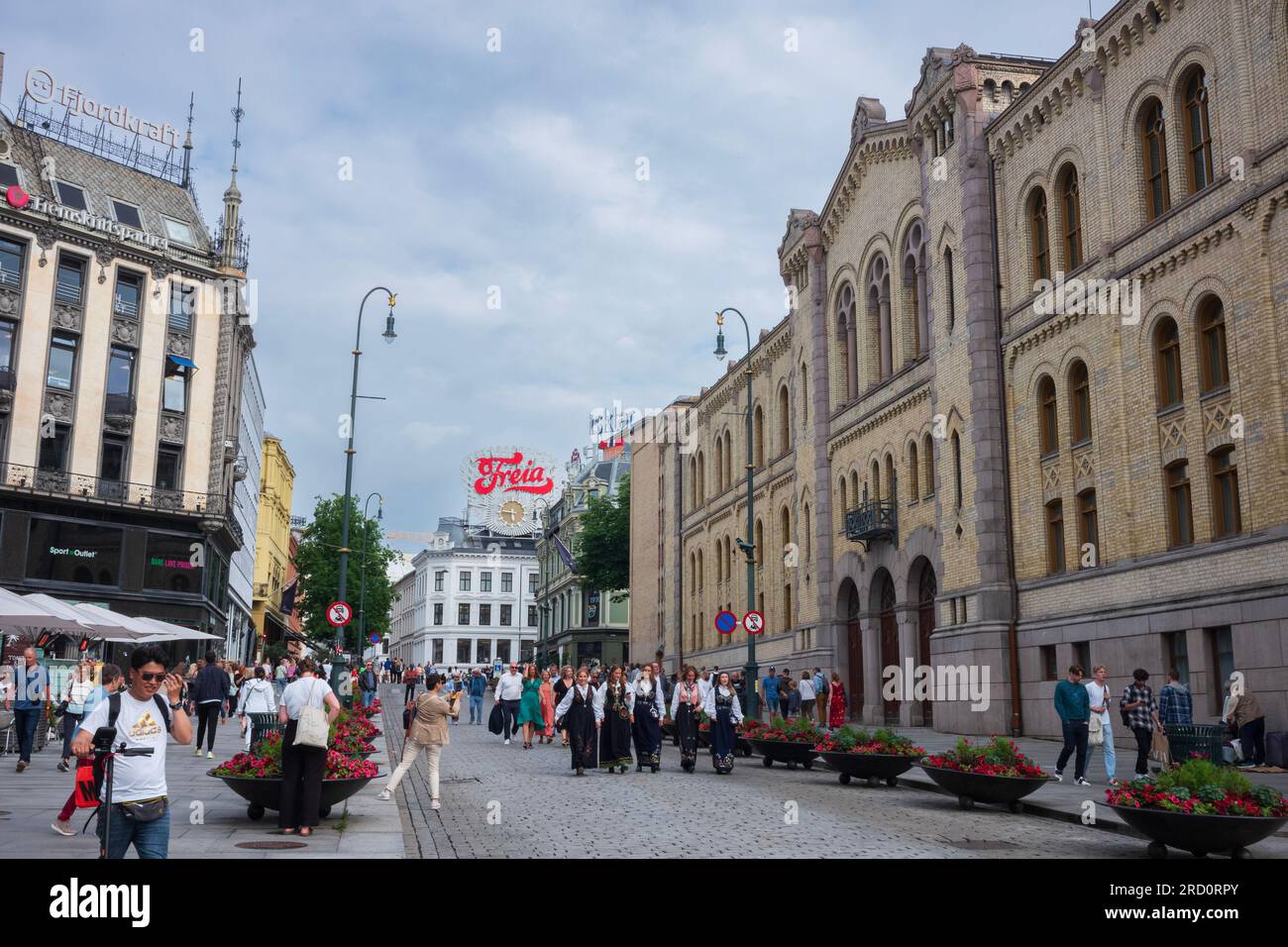 Oslo, Norway, June 20, 2023: People walk along Karl Johans gate, the ...