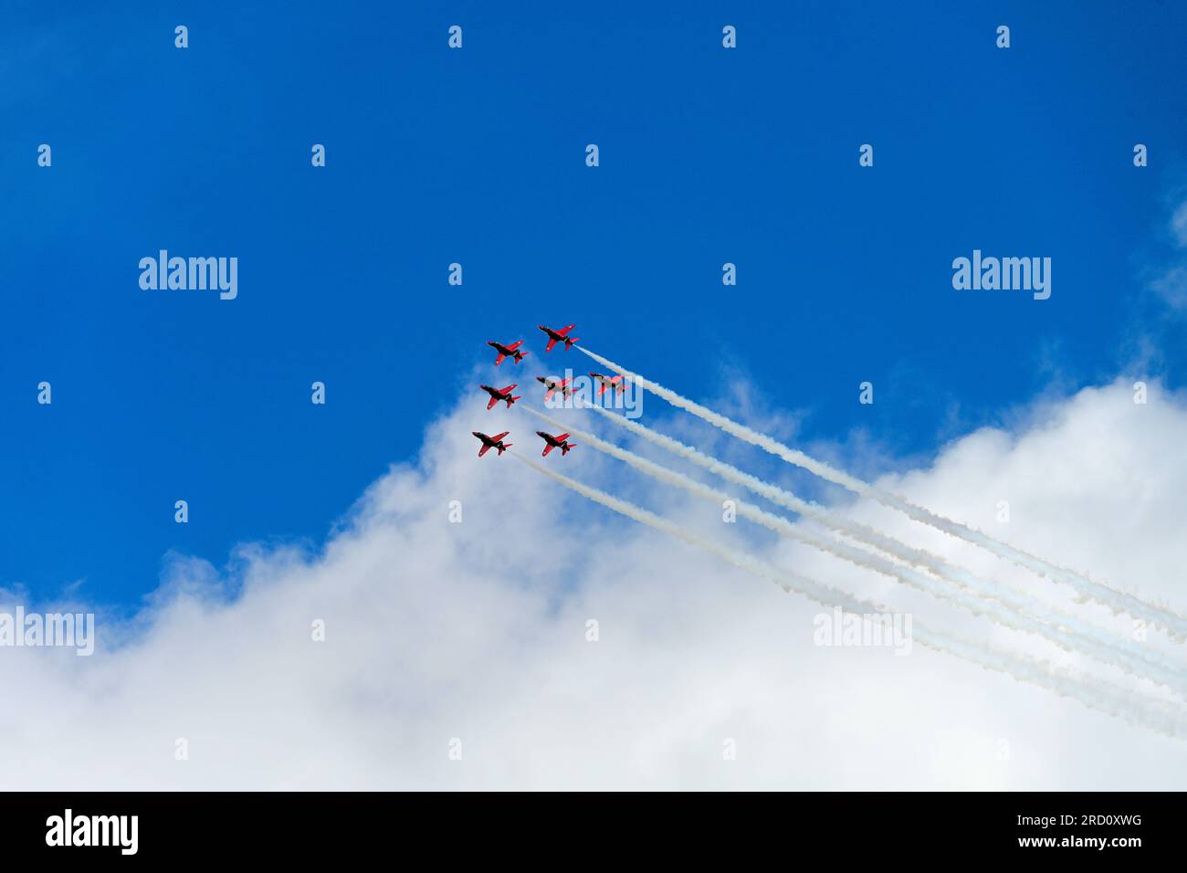 Fairford RIAT air show Saturday 15 July 2023 RAF Red Arrows seven pattern display in blue sky ...