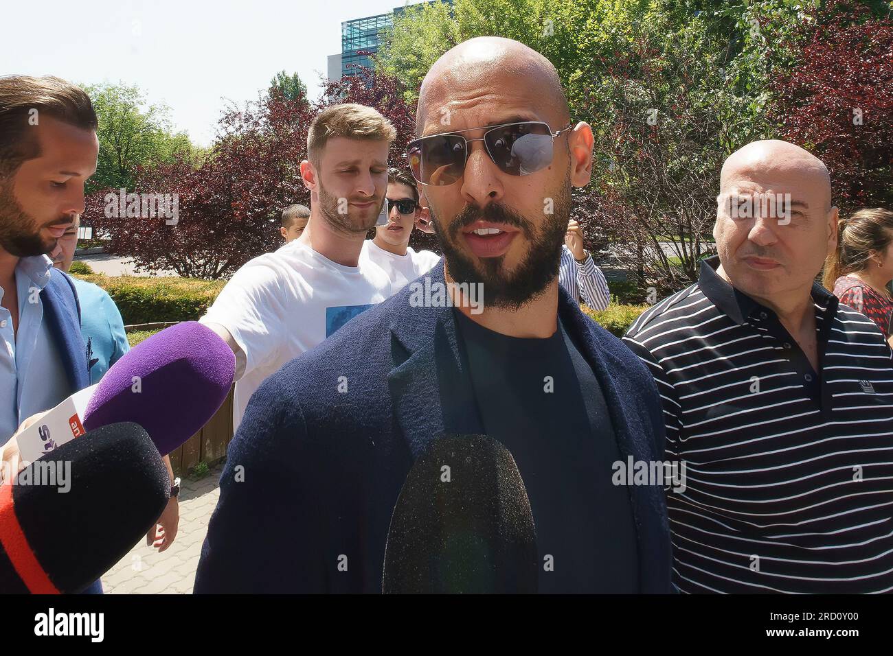 Bucharest, Romania. 17th July, 2023: Andrew Tate (C) and his brother ...